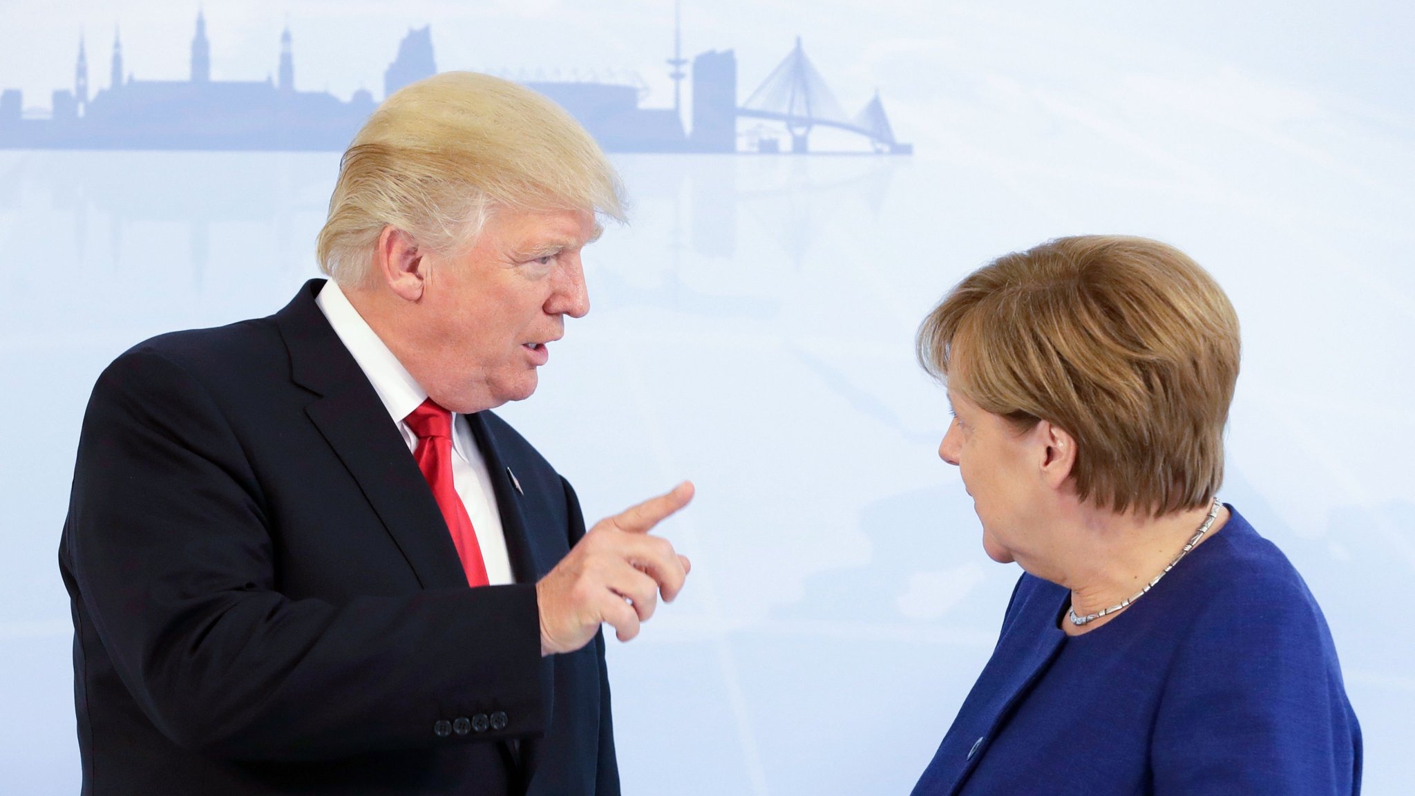 Trump and Merkel meet to reconcile differences