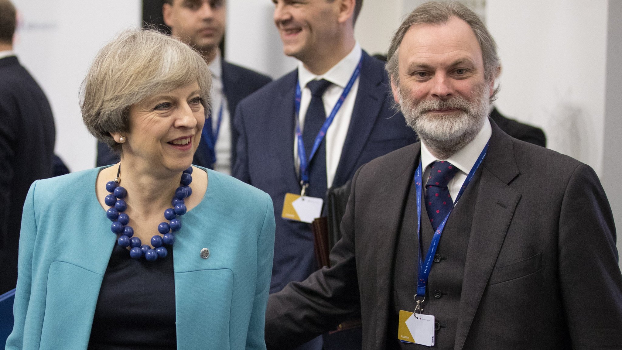 Theresa May backs right of EU citizens to stay in UK